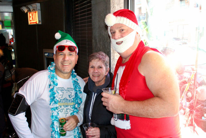 PHOTOS: These sexy Speedo-clad Santas will put you on the naughty list